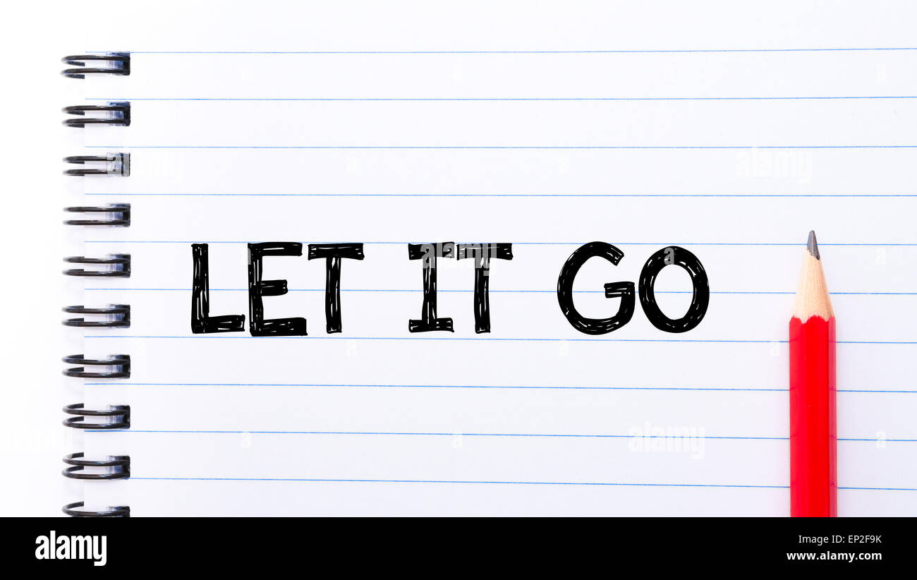 Let It Go Text written on notebook page, red pencil on the right ...
