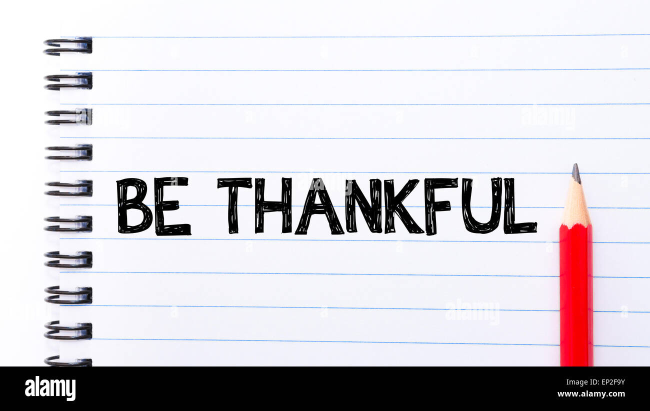 Be Thankful Text written on notebook page, red pencil on the right ...
