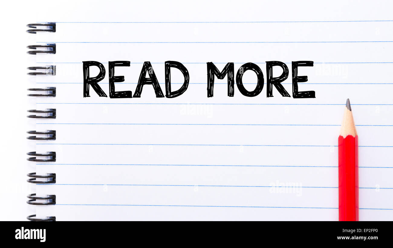 Read More Text written on notebook page, red pencil on the right ...