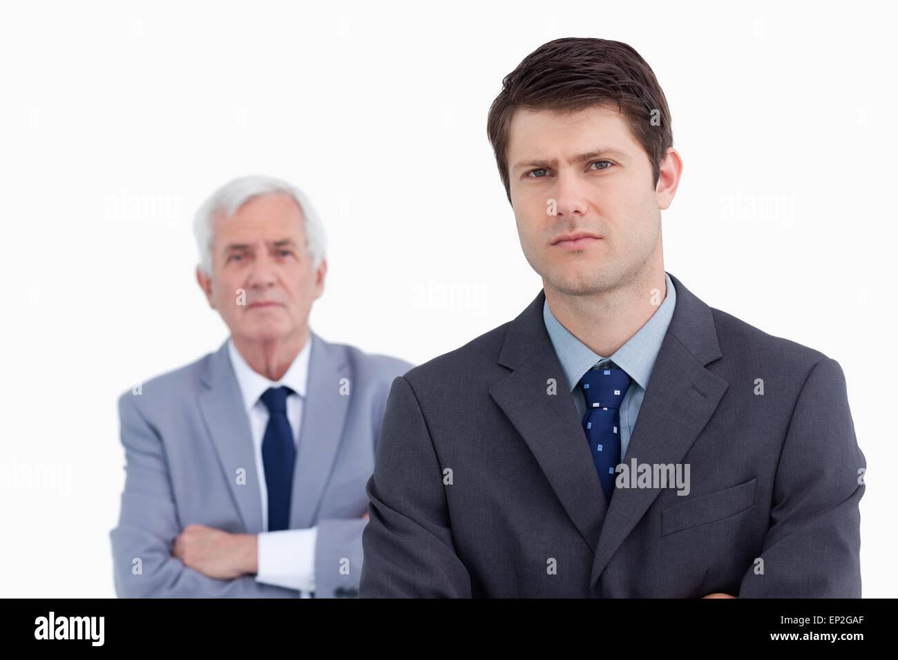 Close up of businessman with his boss behind him Stock Photo - Alamy