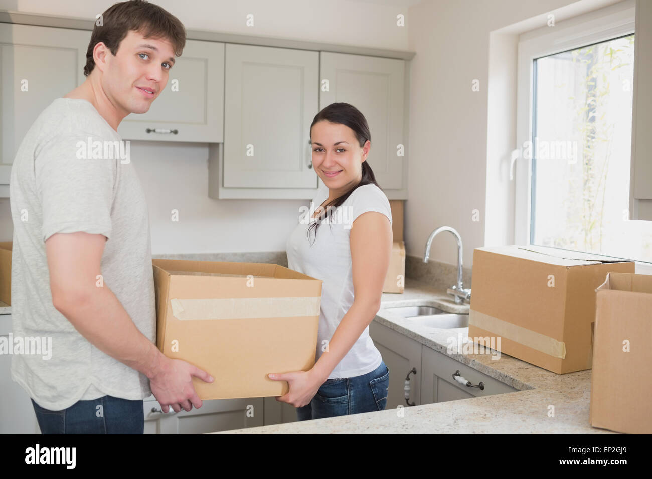 Couple kitchen delivery hi-res stock photography and images - Alamy