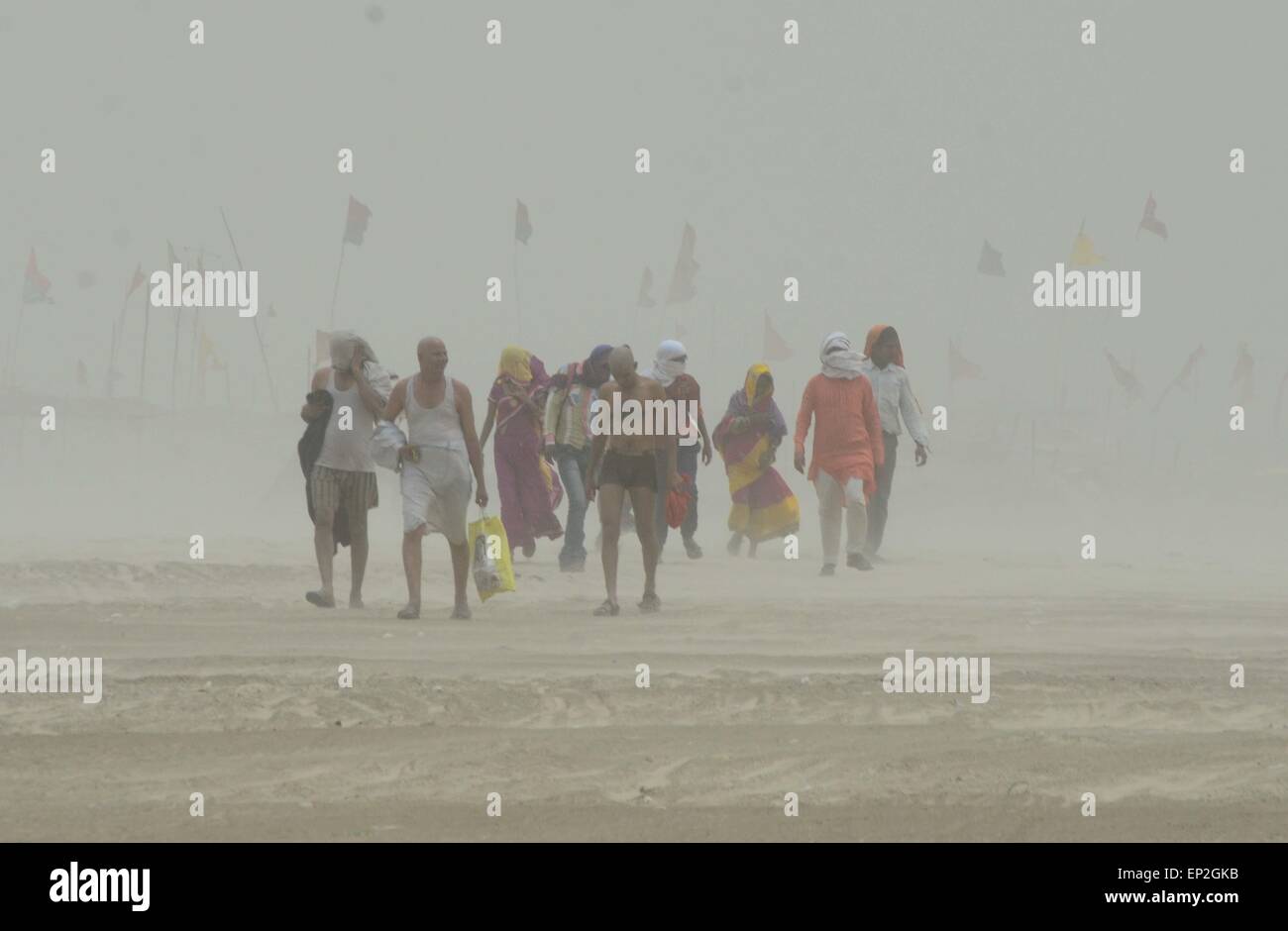 Allahabad, India. 13th May, 2015. Devotees walk trough dust storm at ...