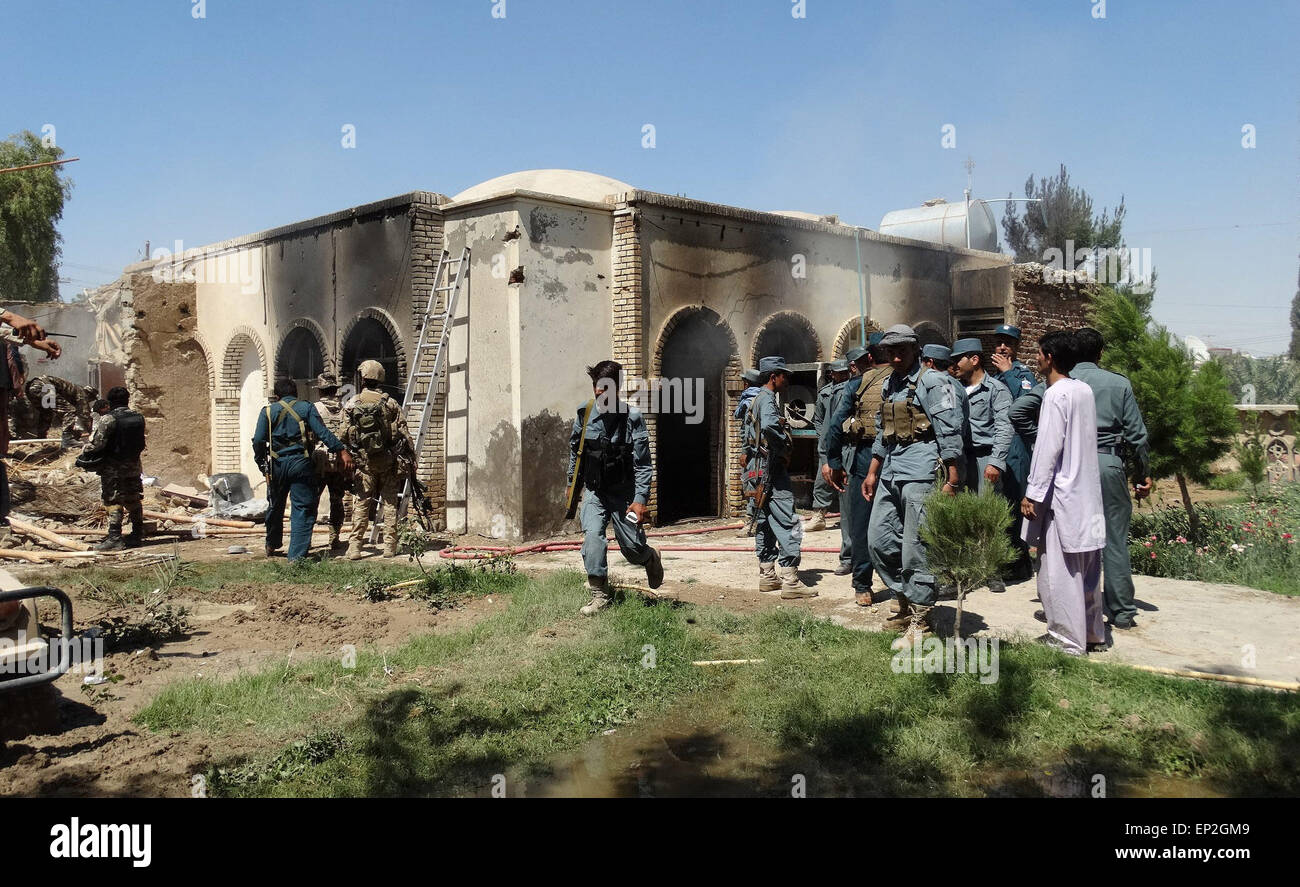 Kabul, Afghanistan. 13th May, 2015. Afghan policemen gather around a ...