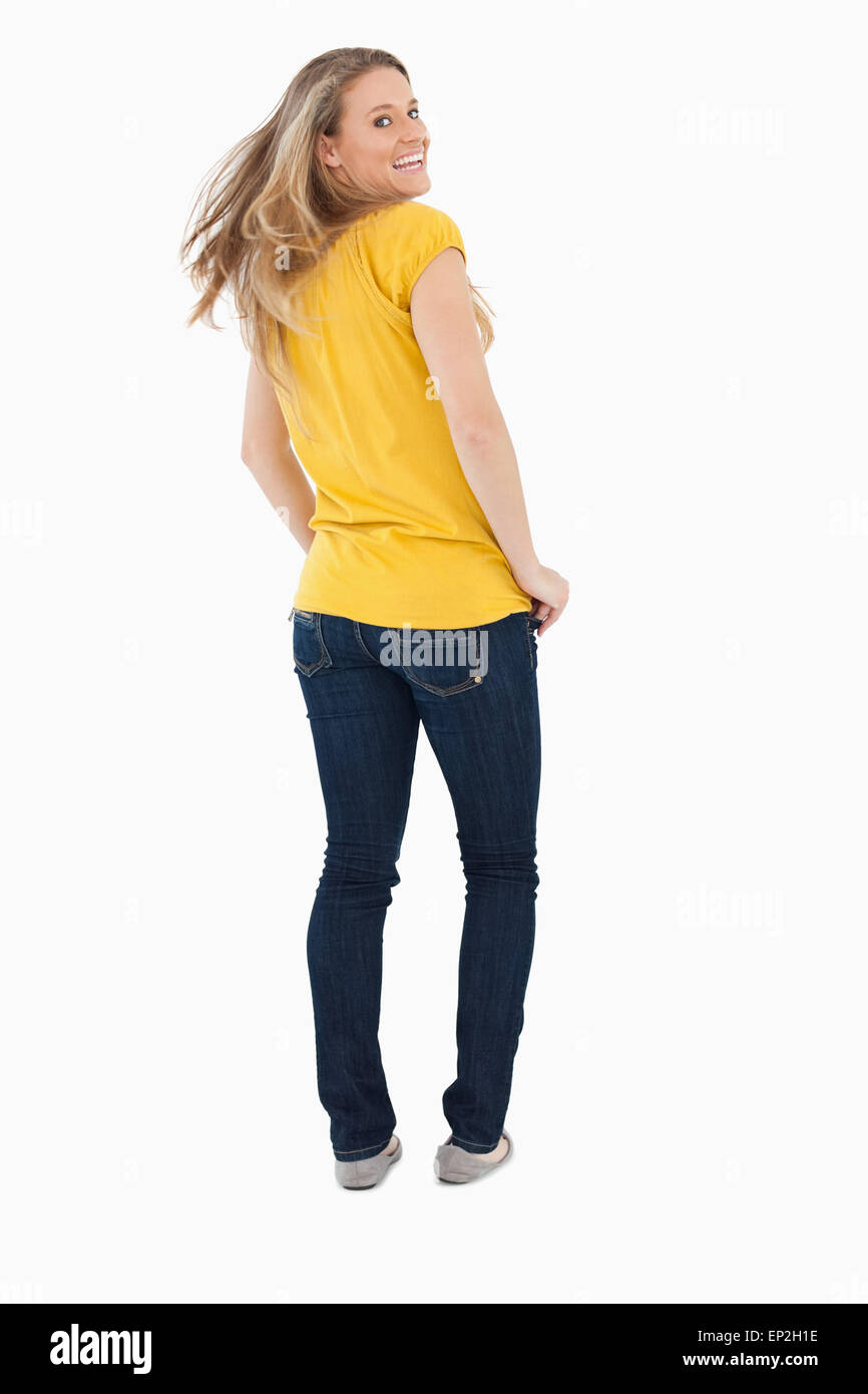 Blonde woman rear view studio Cut Out Stock Images & Pictures - Alamy