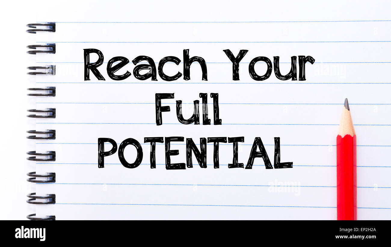 Reach Your Full Potential Text written on notebook page, red pencil on ...