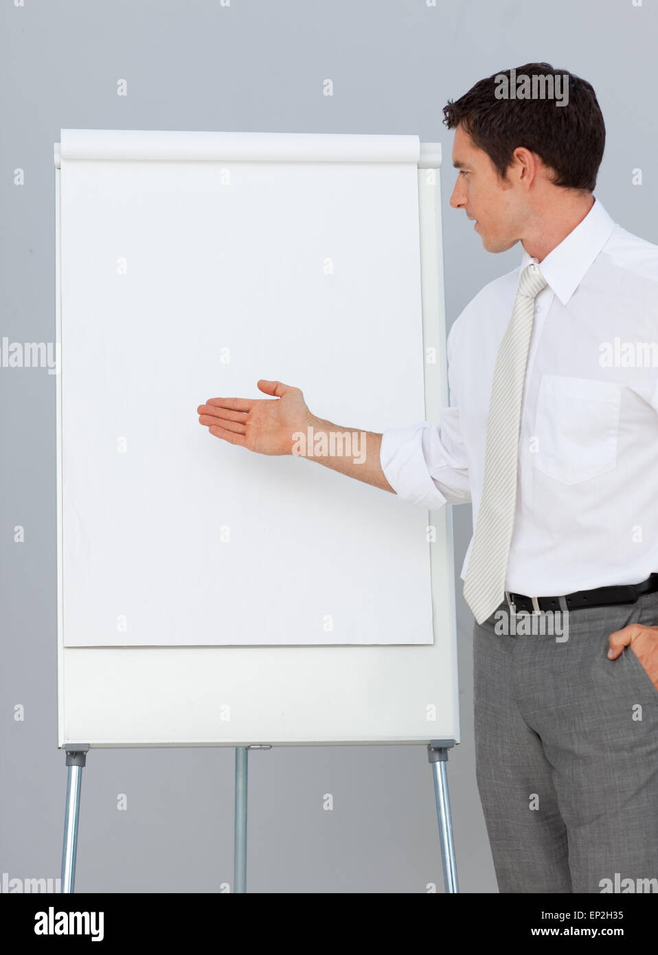 Attractive businessman giving a presentation Stock Photo - Alamy