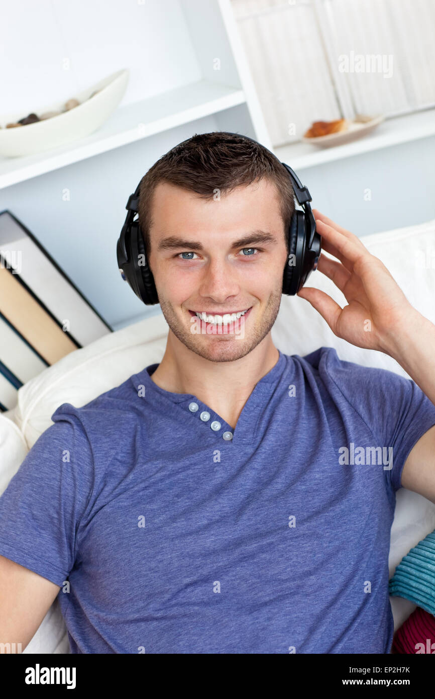 Smiing caucasian man listen to music with headphones Stock Photo - Alamy