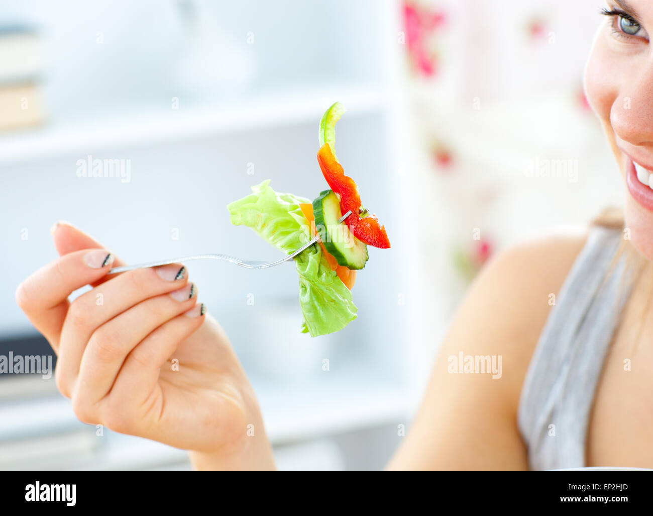 Smiling woman with food Stock Photo - Alamy