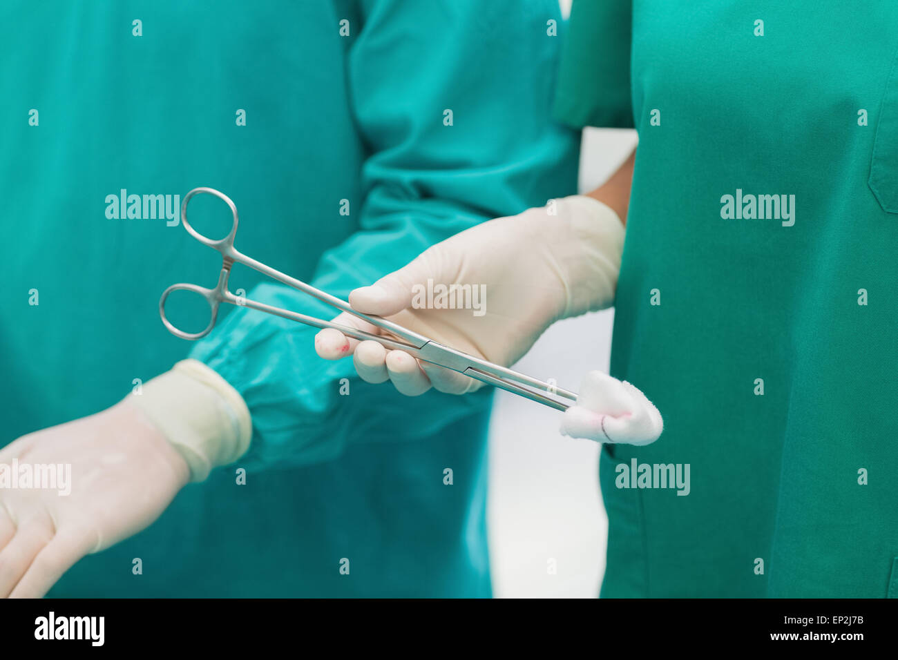 Close up of a surgical scissors with a compress Stock Photo - Alamy