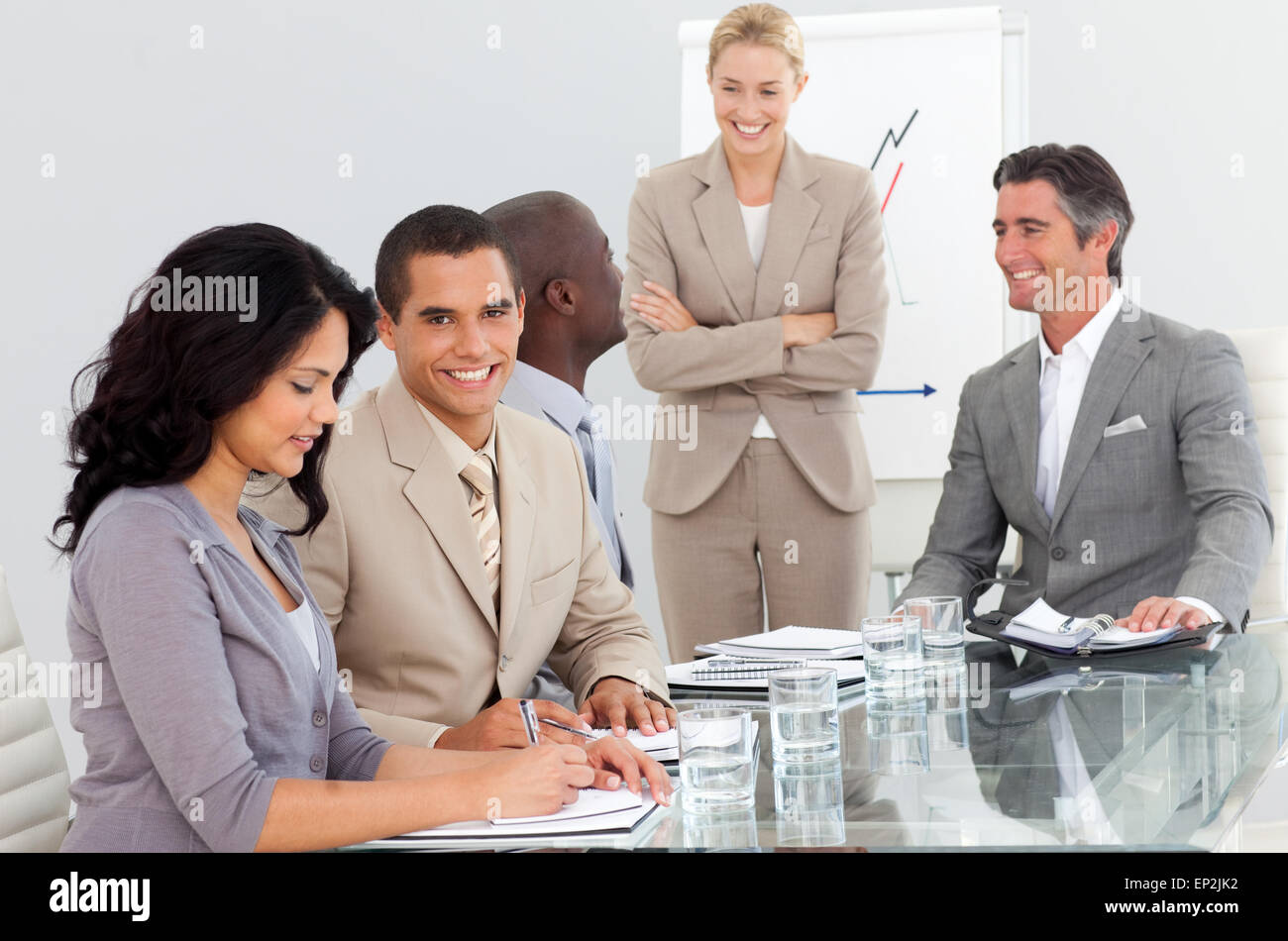 Potrait of a business team at a presentation Stock Photo - Alamy