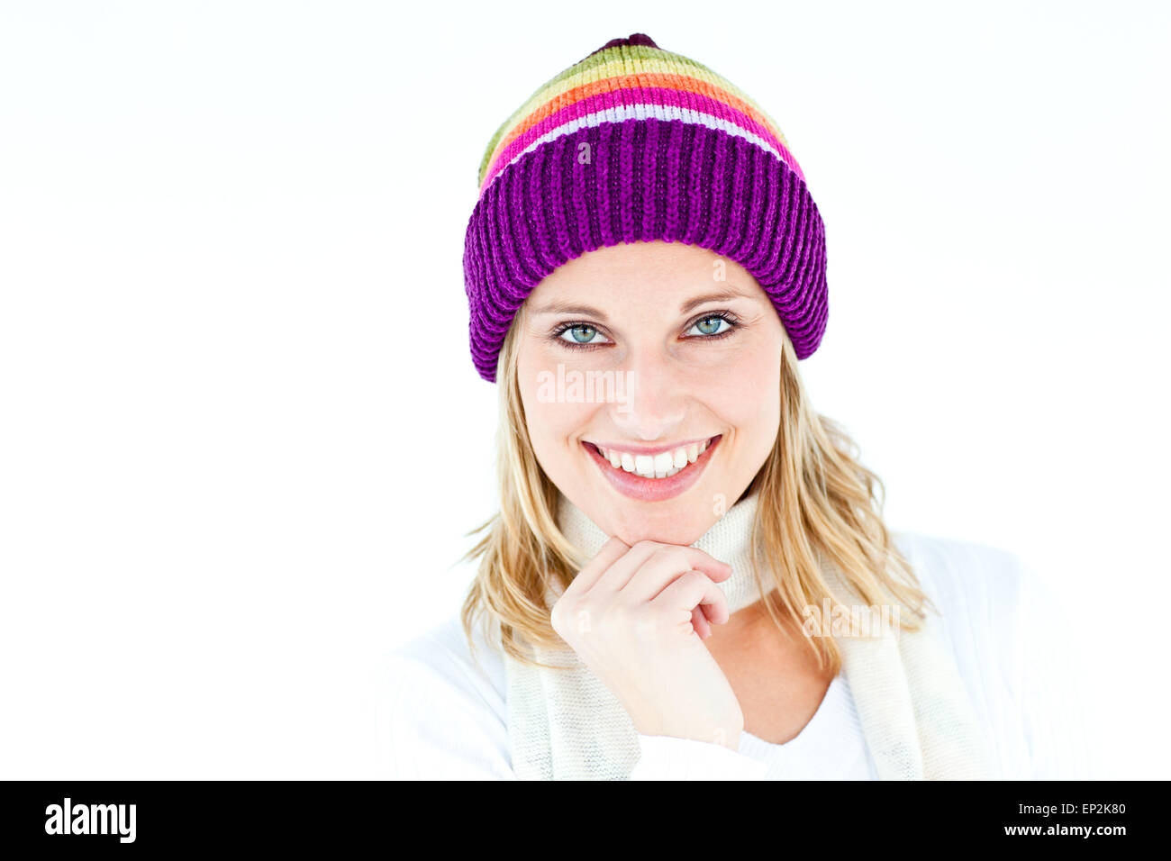 Merry woman with a colorful hat smiling at the camera Stock Photo - Alamy
