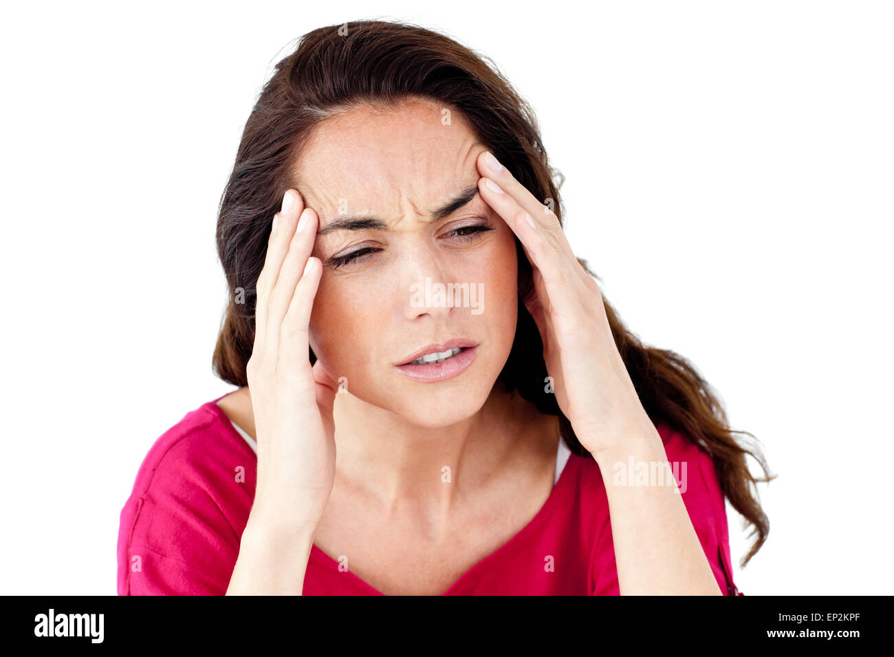 Downcast hispanic woman having a headache against a white background ...