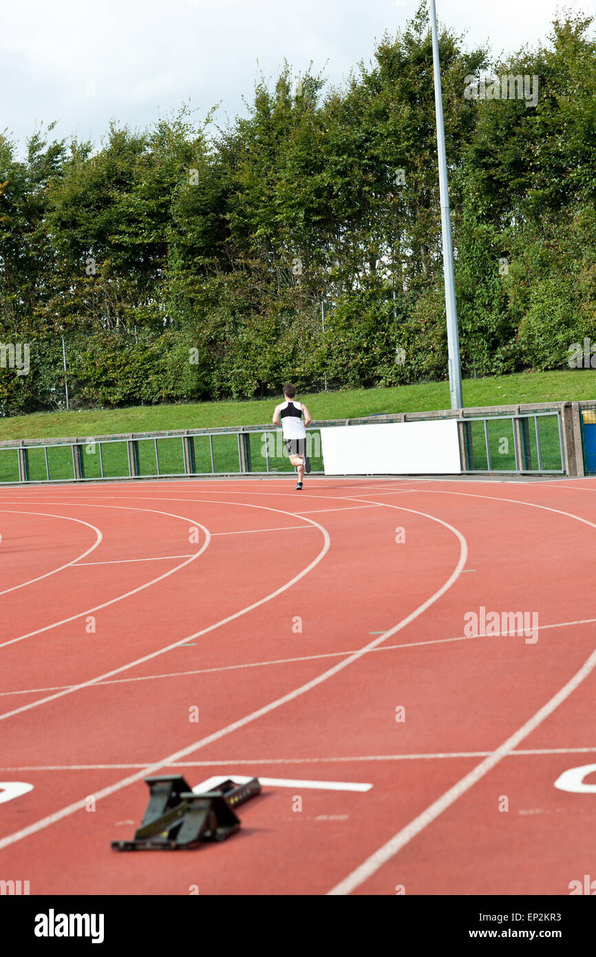 Good-looking male sprinter training Stock Photo - Alamy