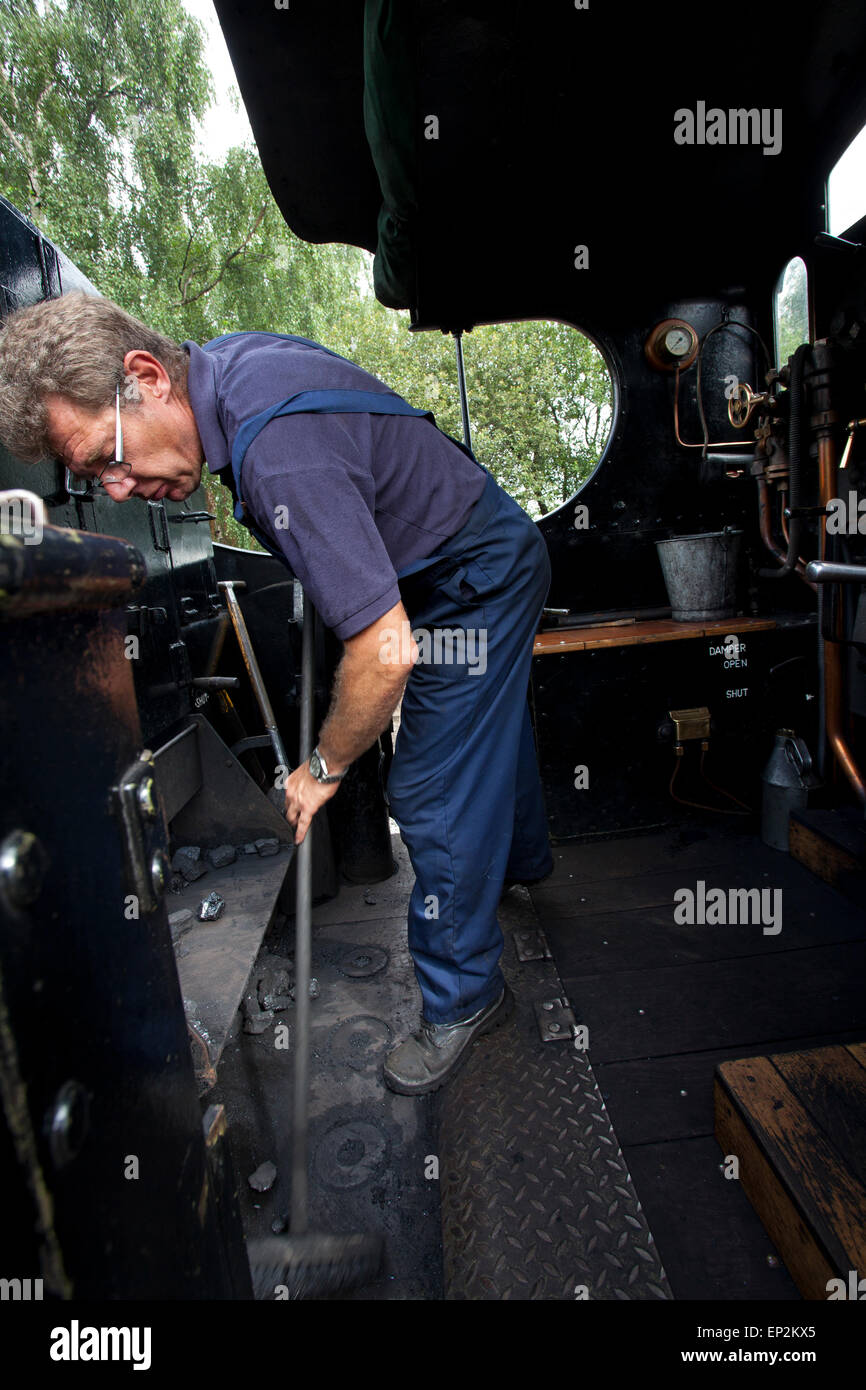train driver on a steam locomotive at the Keighley and Worth Valley ...