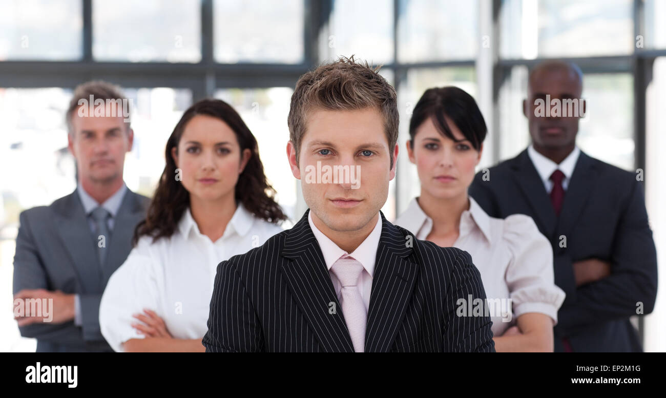 Portrait of a serious business team looking at the camera Stock Photo ...