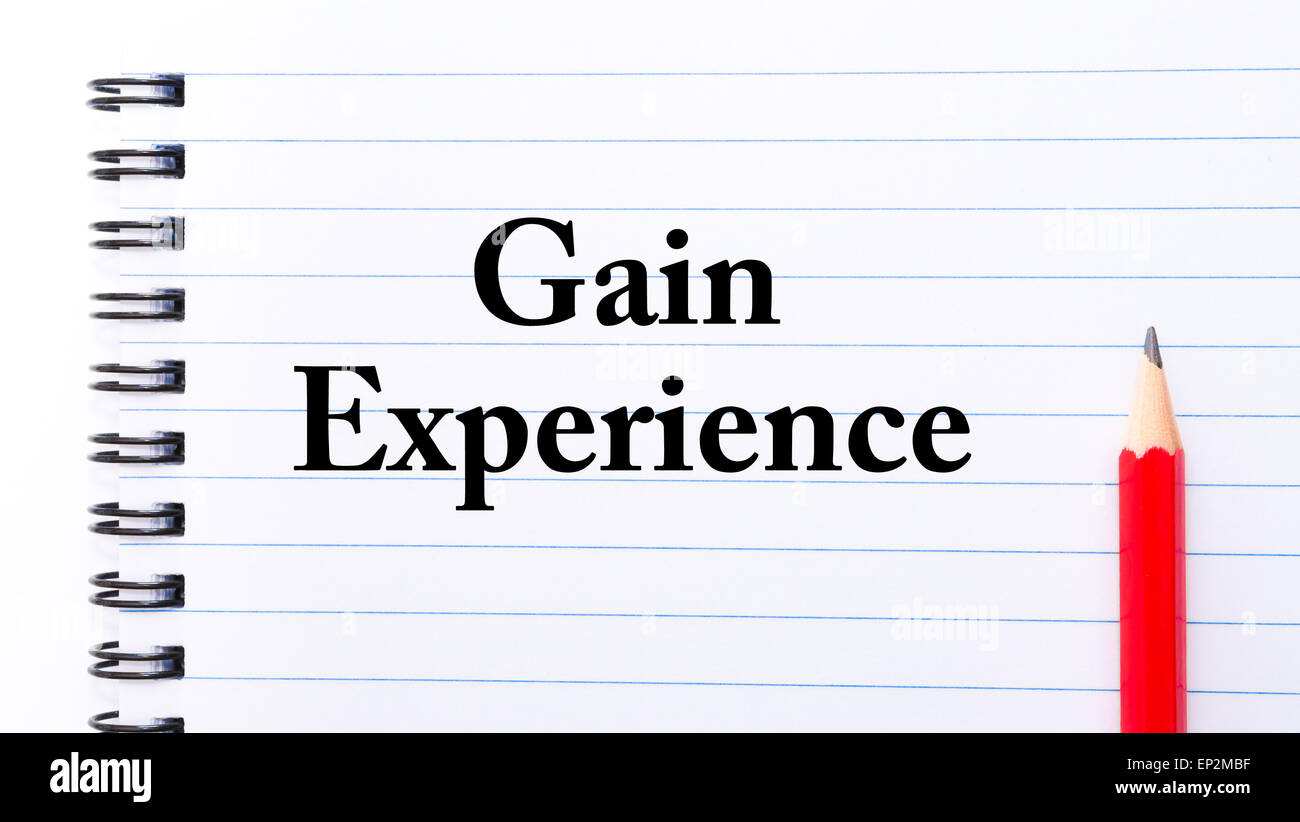 Gain Experience Text written on notebook page, red pencil on the right ...