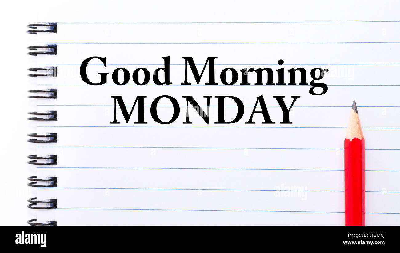 Good Morning Monday Text written on notebook page, red pencil on the ...