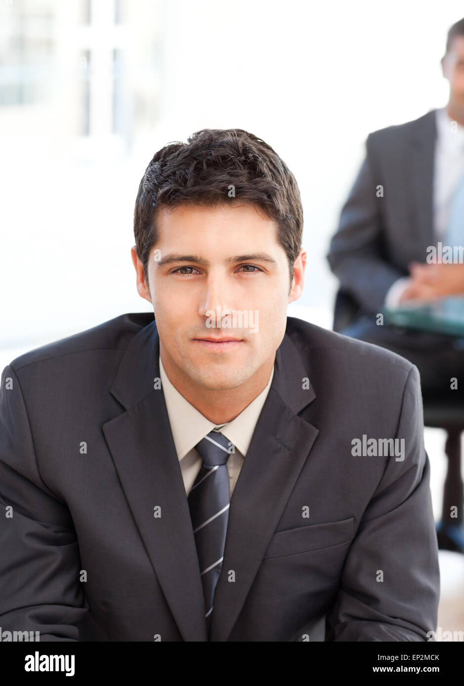 Serious businessman during an interview with a co-worker Stock Photo ...