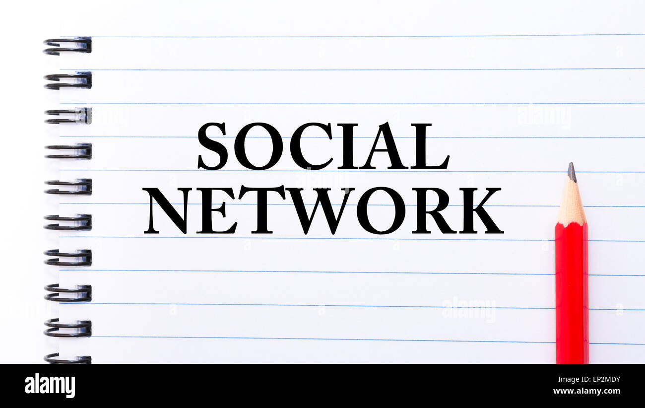 Social Network Text written on notebook page, red pencil on the right ...
