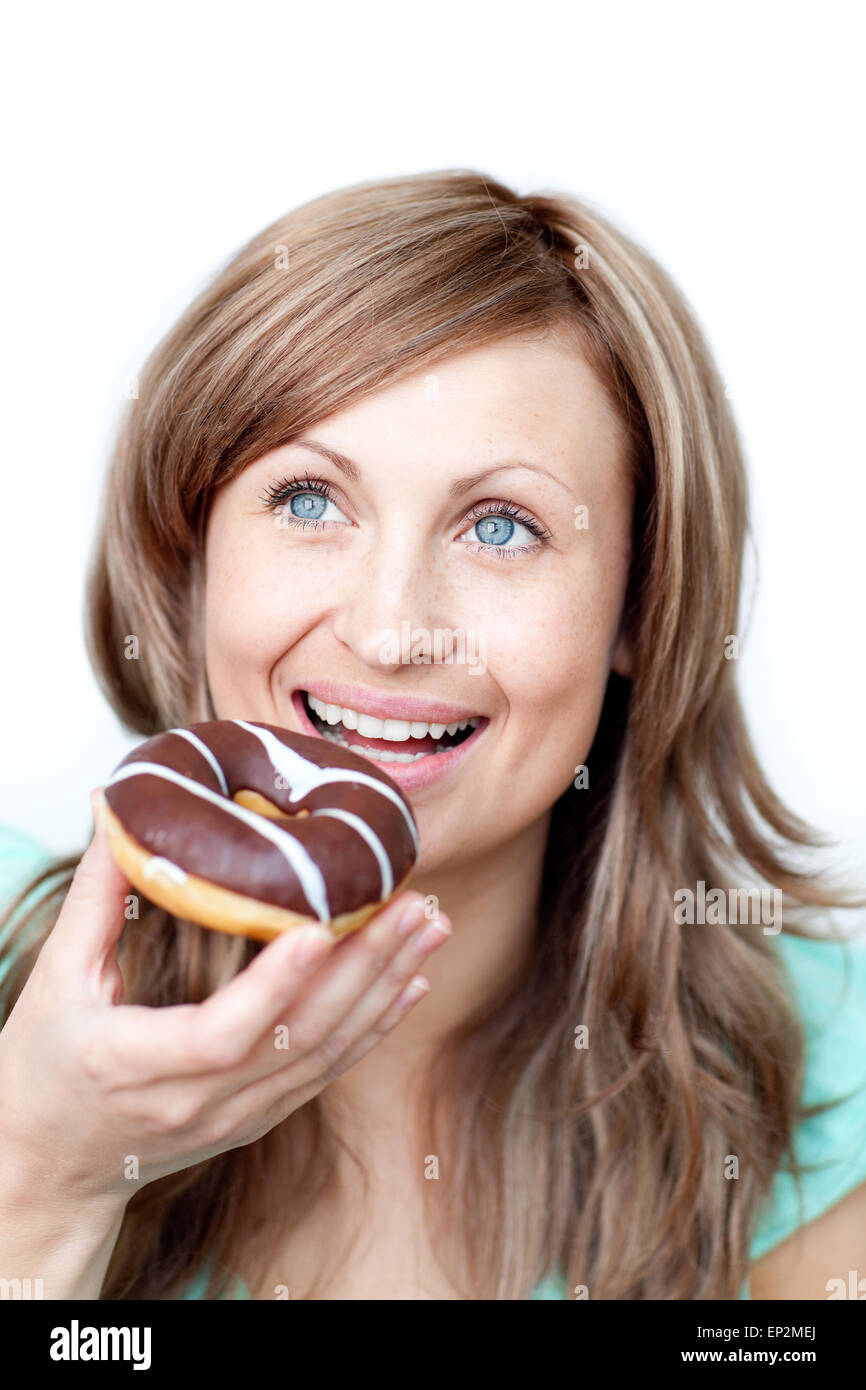 Hungry woman eating a cake Stock Photo - Alamy
