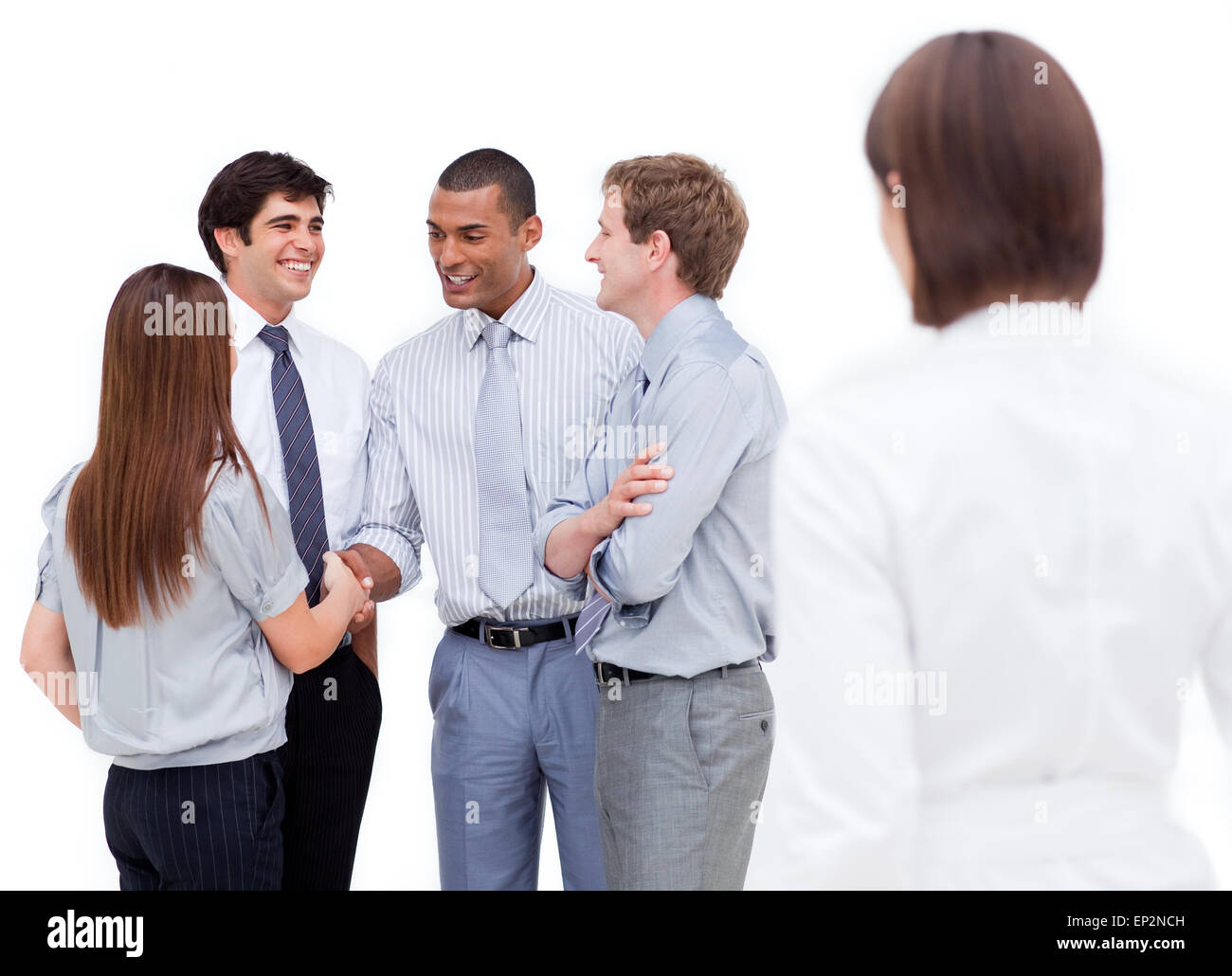 Businesswoman looking back at her colleagues isolated on a white ...