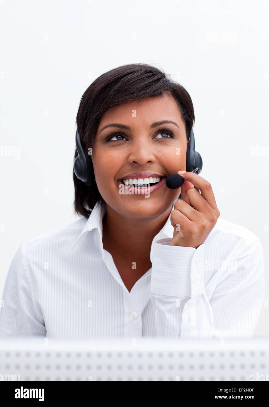 Smiling customer service agent with headset on Stock Photo - Alamy