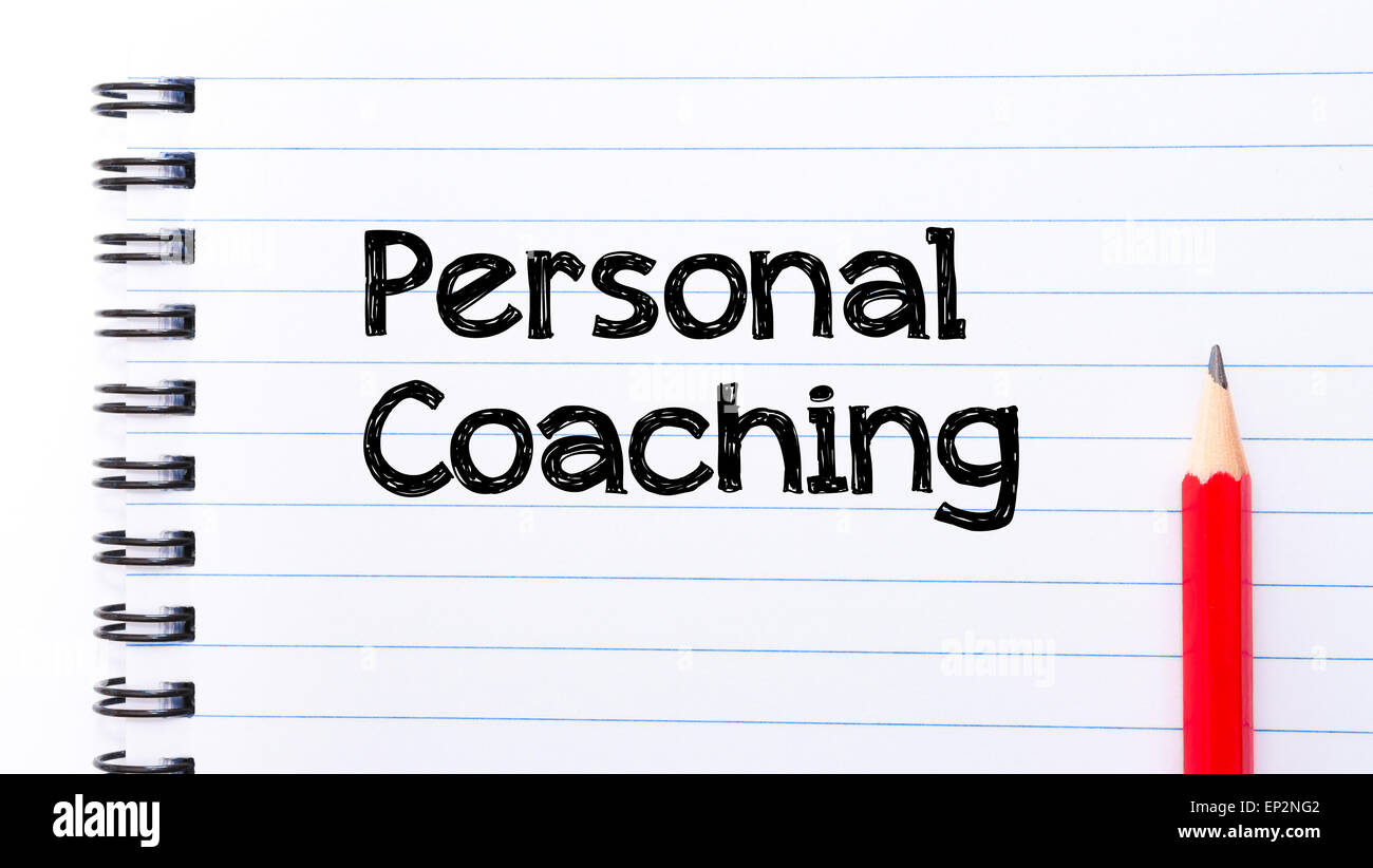 Personal coaching Text written on notebook page, red pencil on the ...