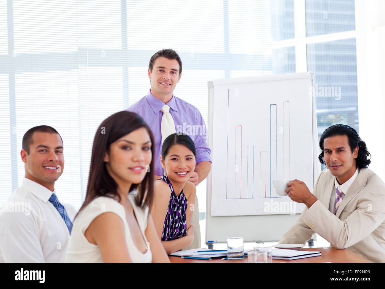 Young businessman presenting figures Stock Photo - Alamy