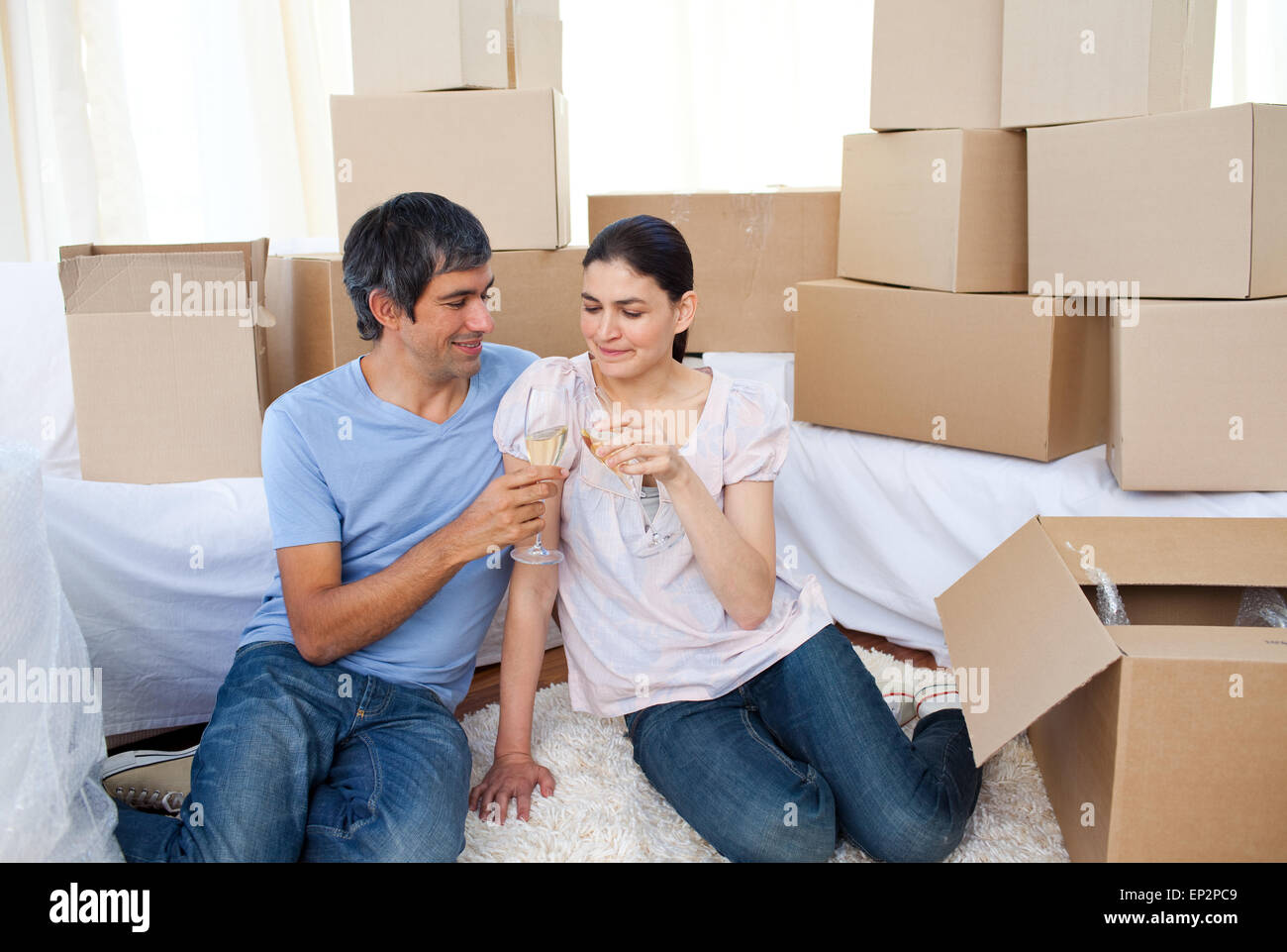Loving couple toasting with Champagne Stock Photo - Alamy