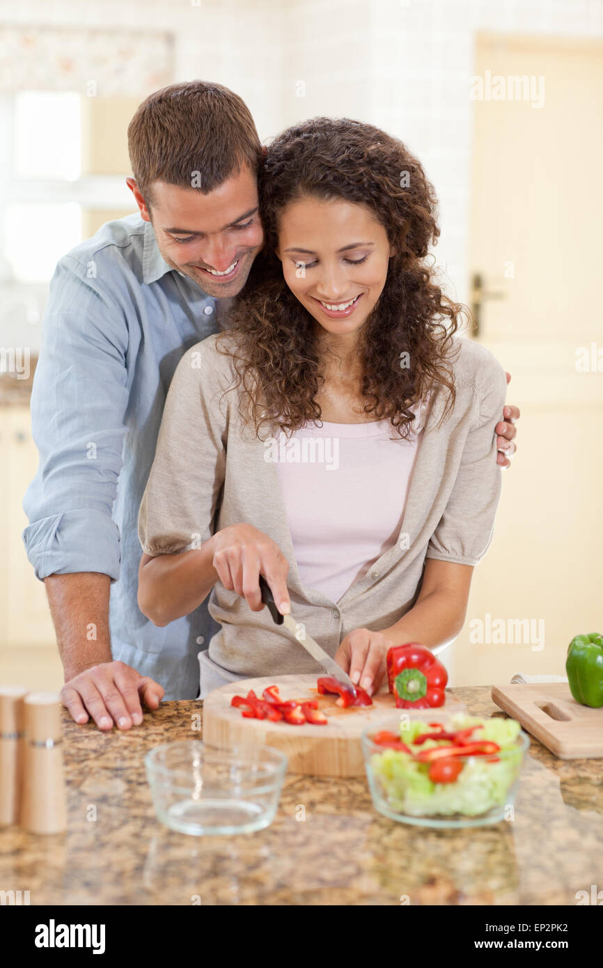 Handsome man cooking with his girlfriend Stock Photo - Alamy