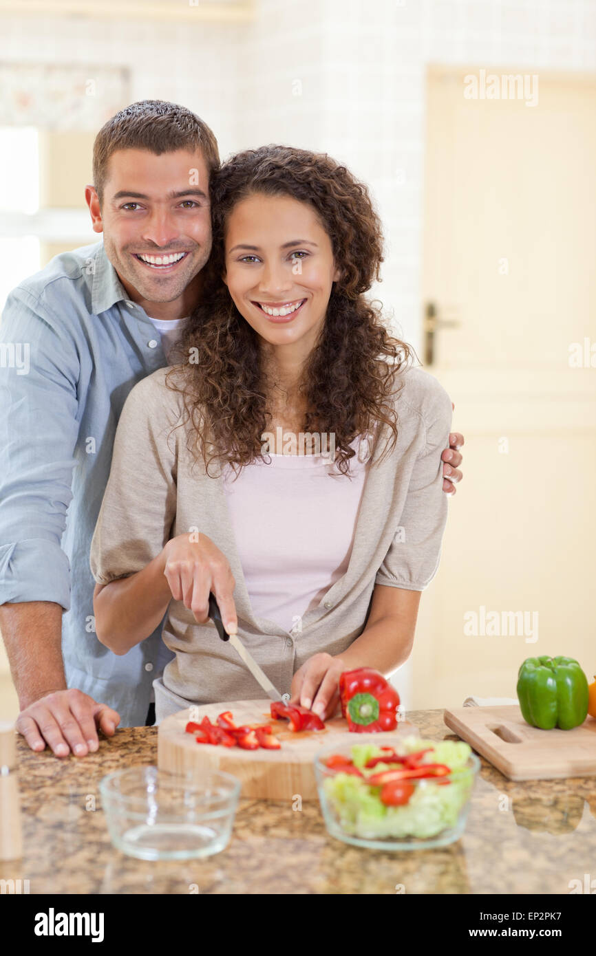 Handsome man cooking with his girlfriend Stock Photo - Alamy