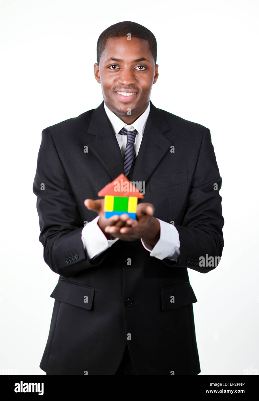 Handsome businessman manager offering a house Stock Photo - Alamy