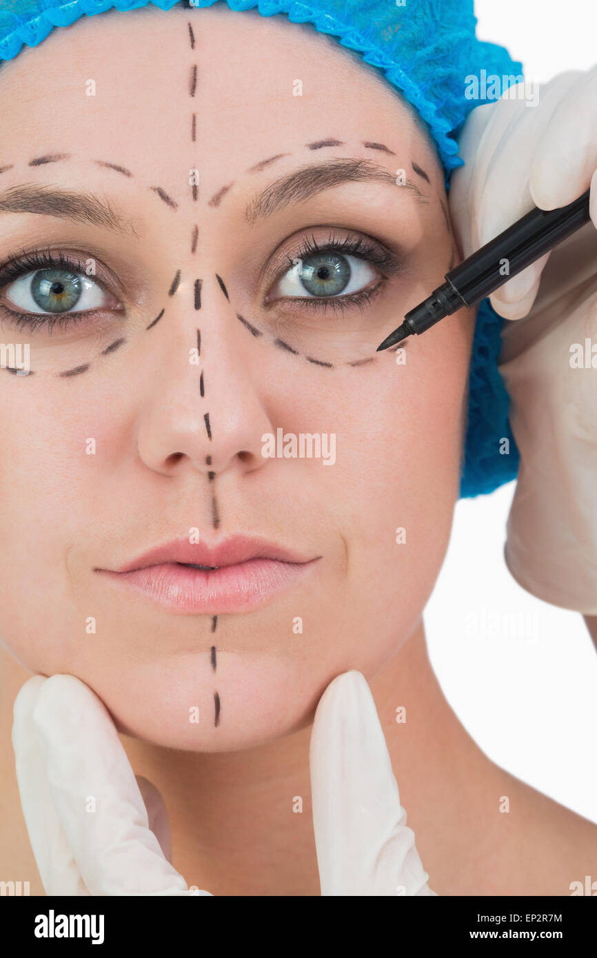 Doctor drawing lines on face hi-res stock photography and images - Alamy
