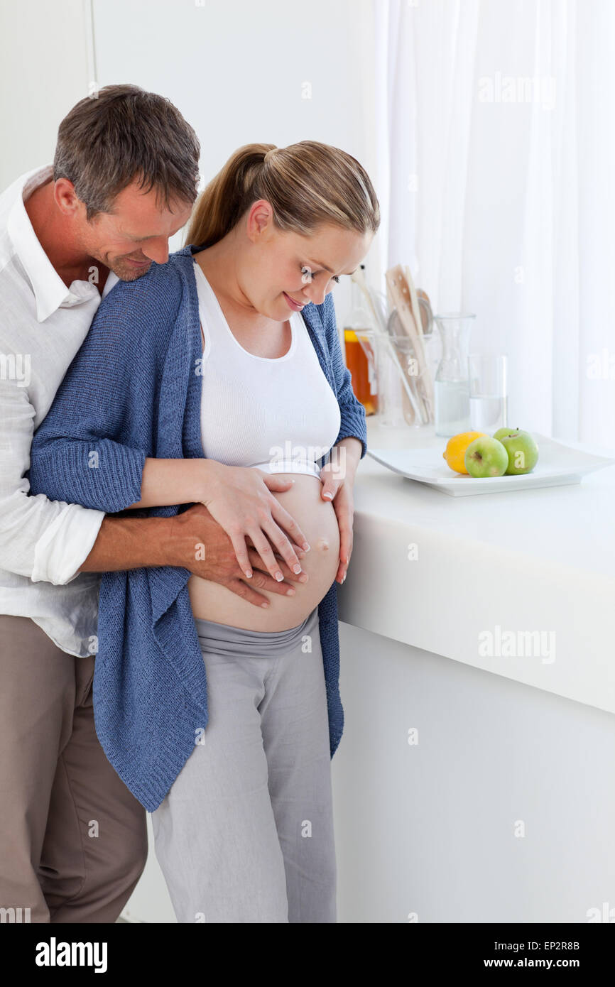 Stomach hugging human hi-res stock photography and images - Alamy