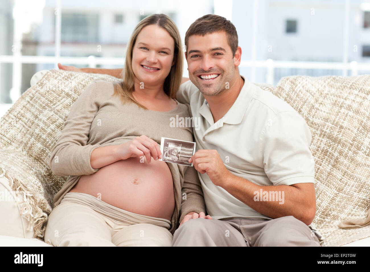 Cheerful couple future parents hi-res stock photography and images - Alamy
