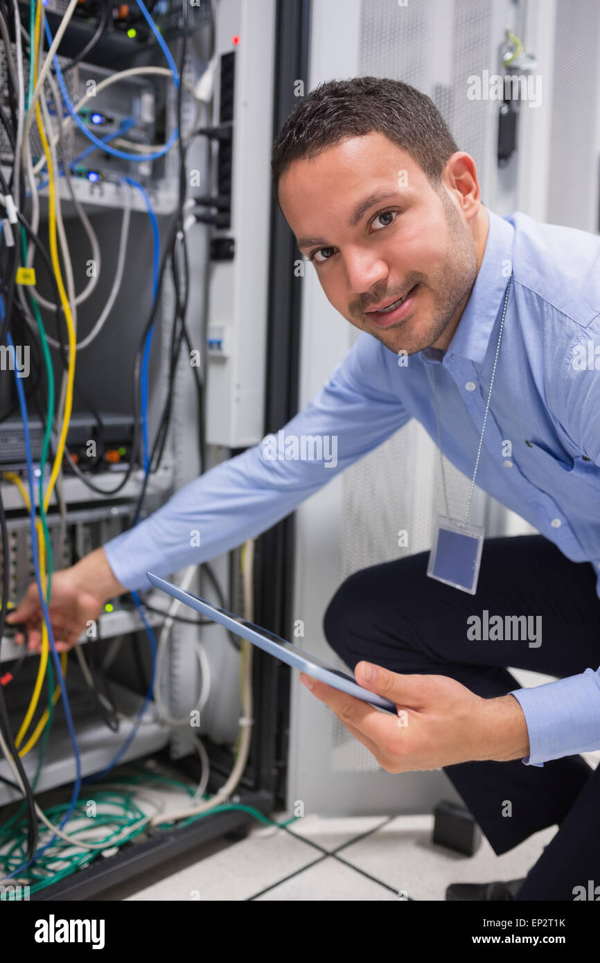 Man plugging in cables hi-res stock photography and images - Alamy