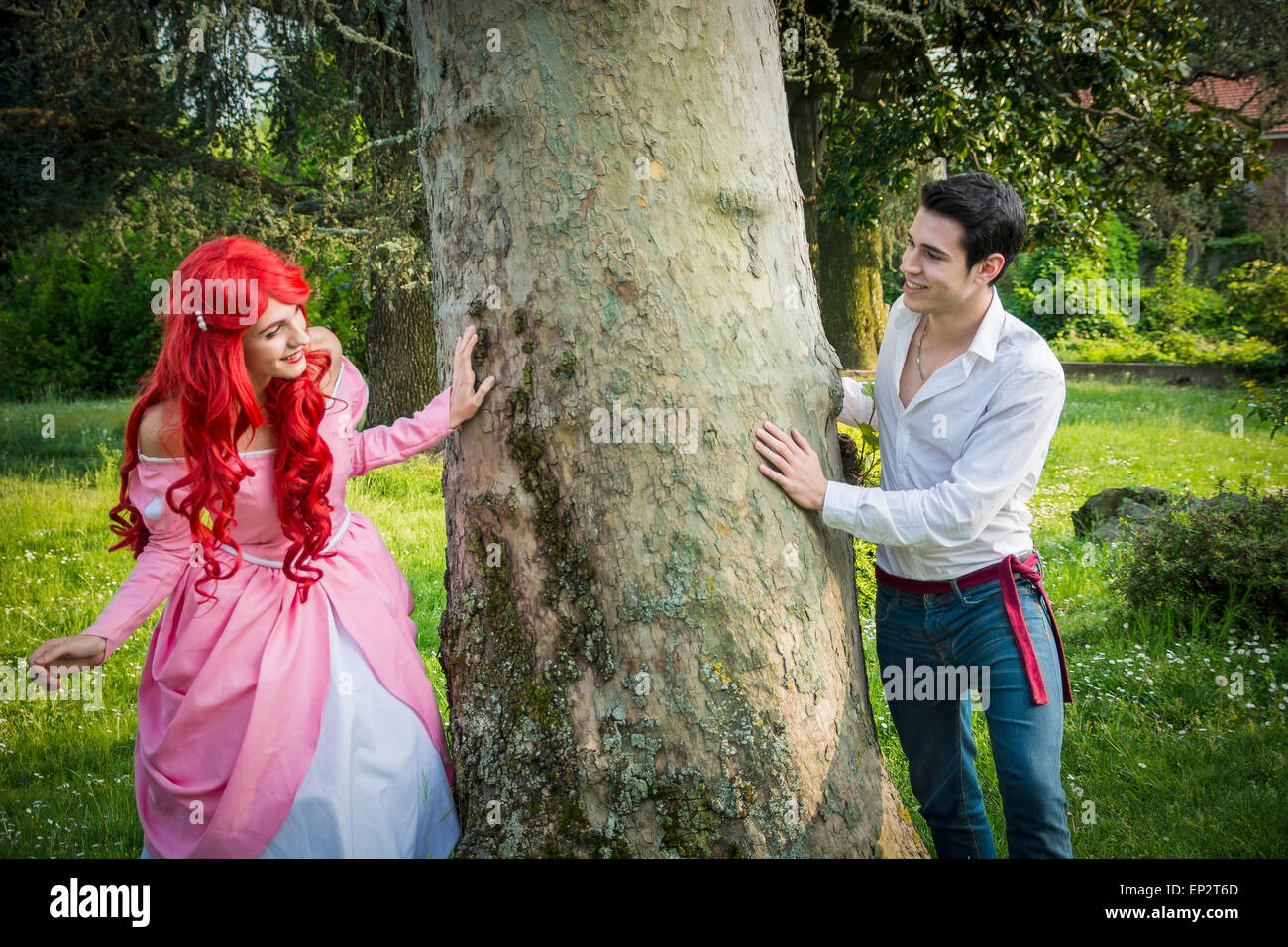 Romantic Fairy Tale Couple Sitting in Garden among Flowers in Peaceful ...