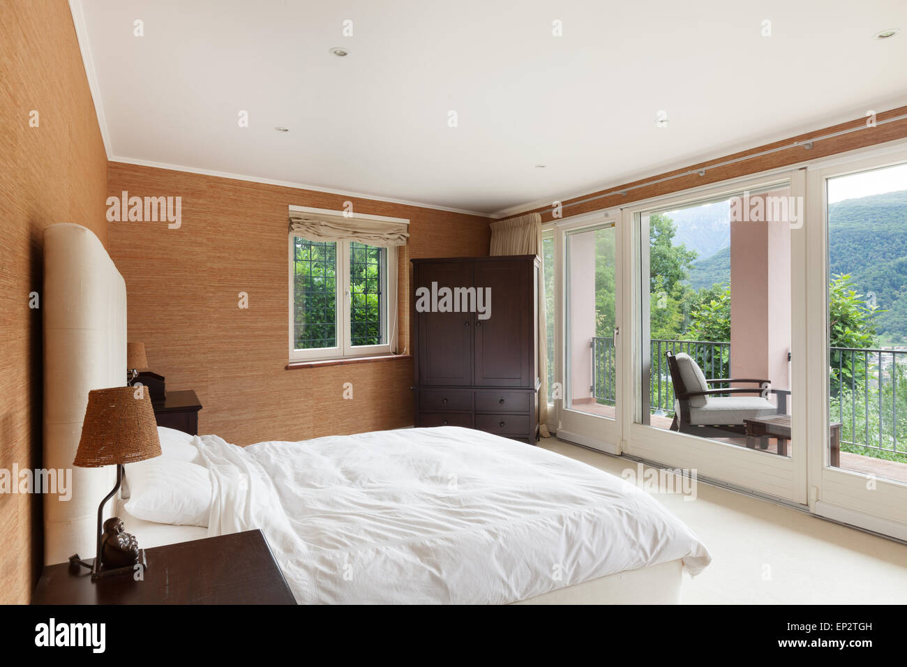 Nice house interior, comfortable bedroom Stock Photo - Alamy