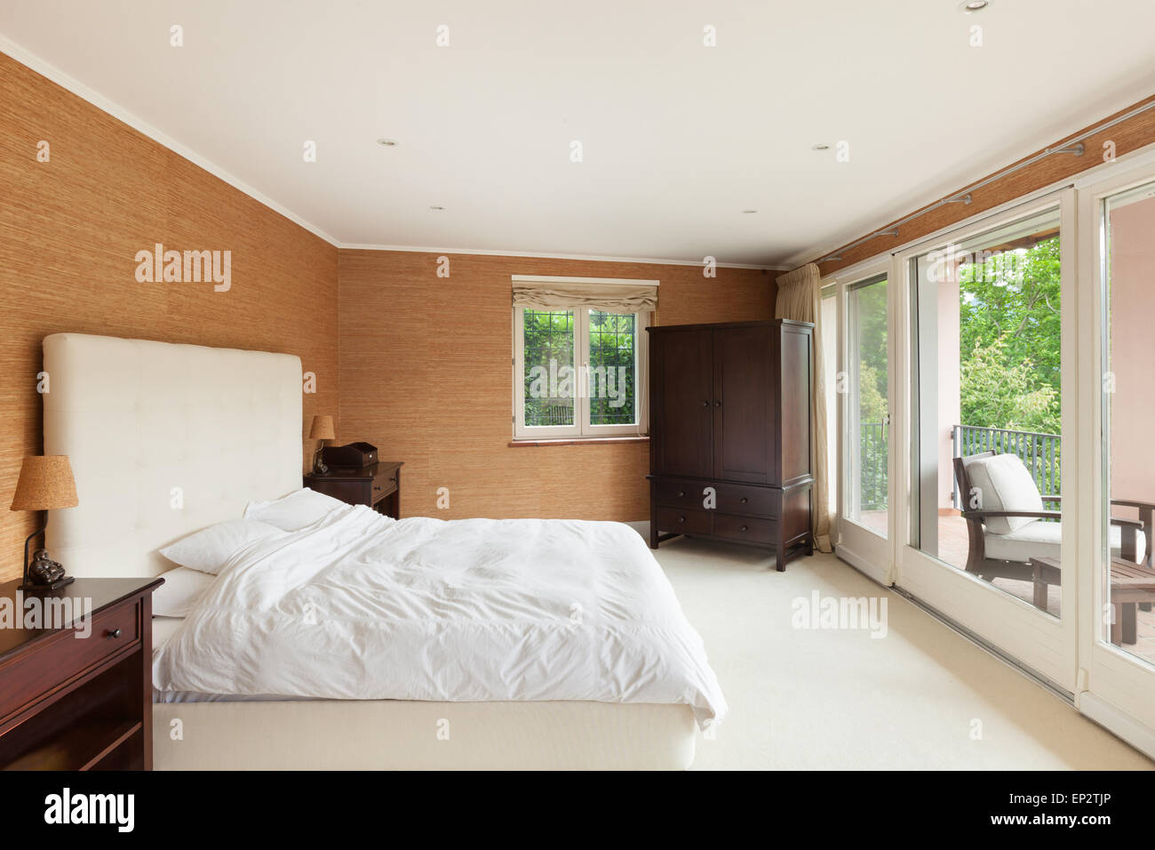 Nice house interior, comfortable bedroom Stock Photo - Alamy