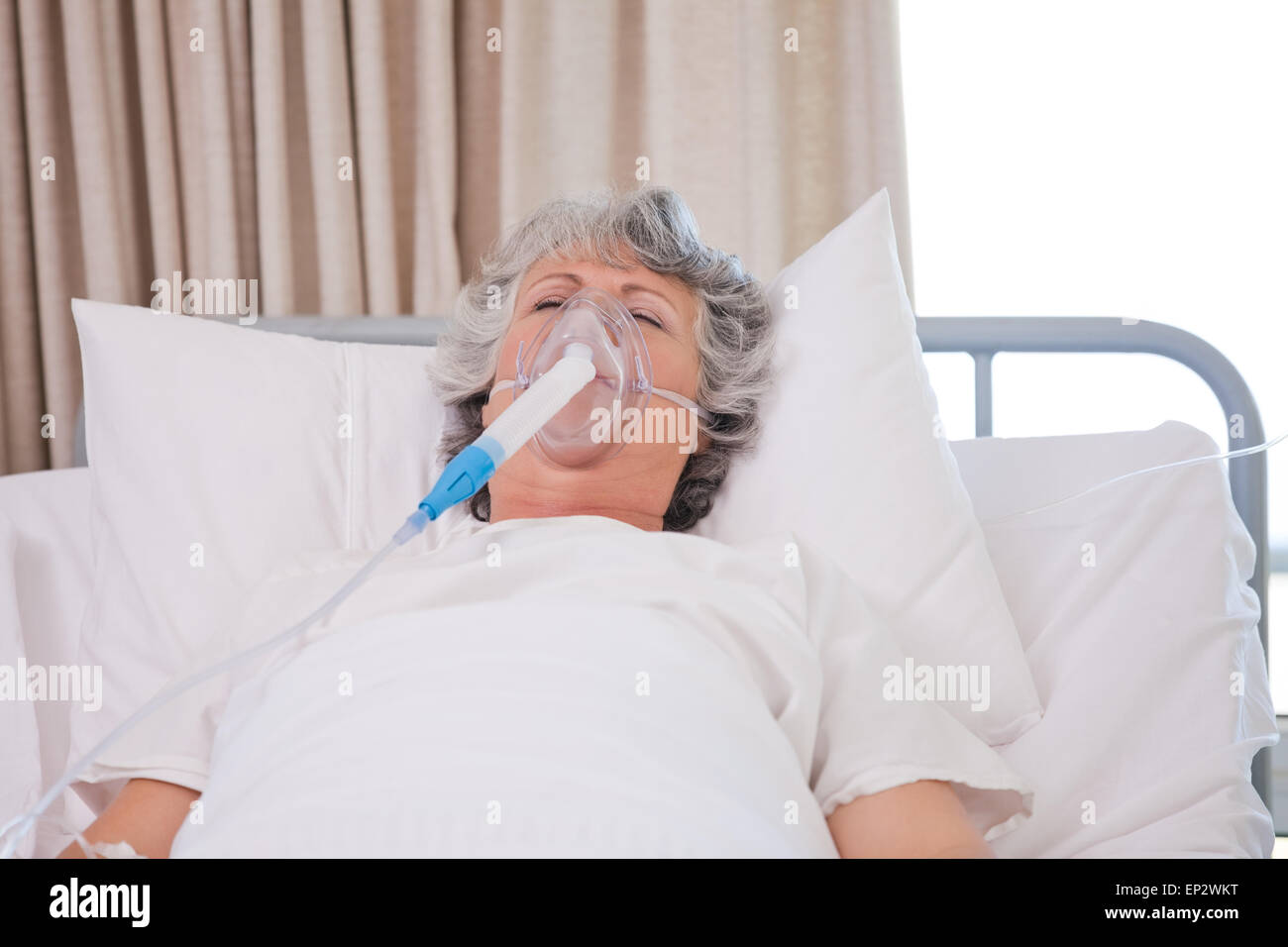 Senior woman with her respirator Stock Photo - Alamy