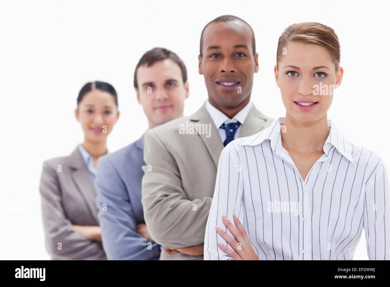Close-up of colleagues in a single line crossing their arms Stock Photo ...