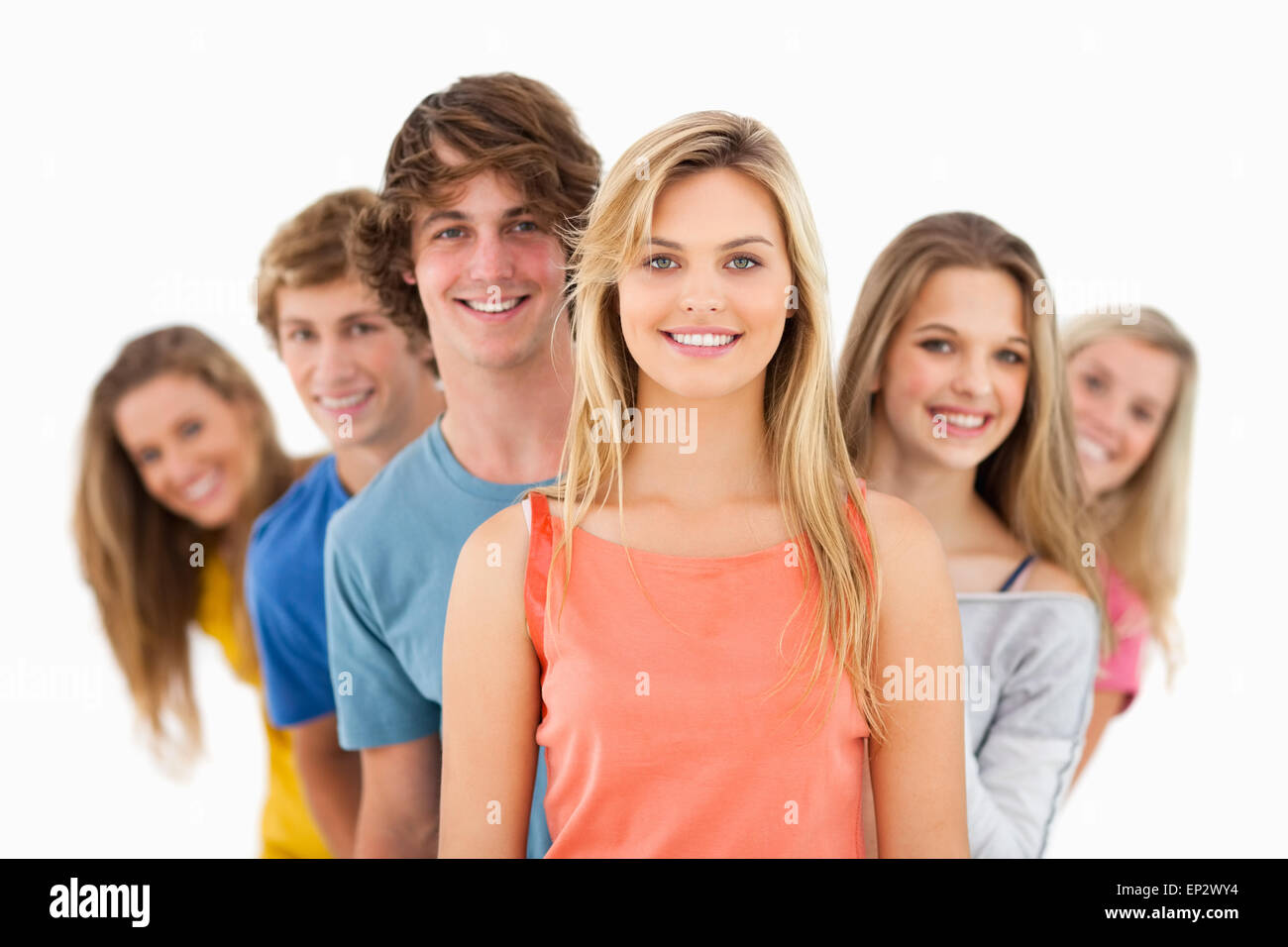 Group standing behind one another at varied angles Stock Photo - Alamy