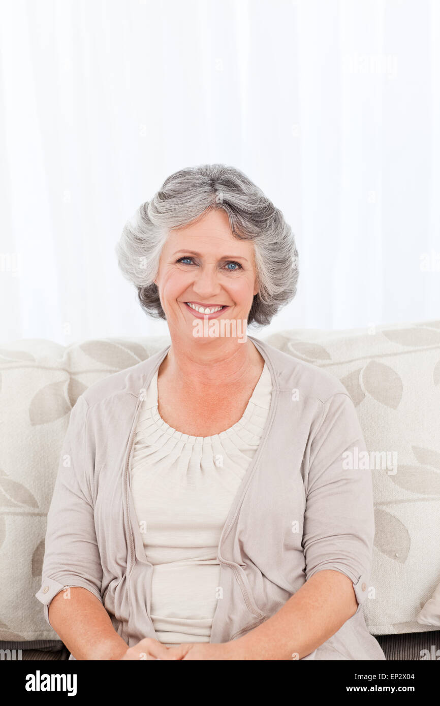 Smiling retired woman Stock Photo - Alamy