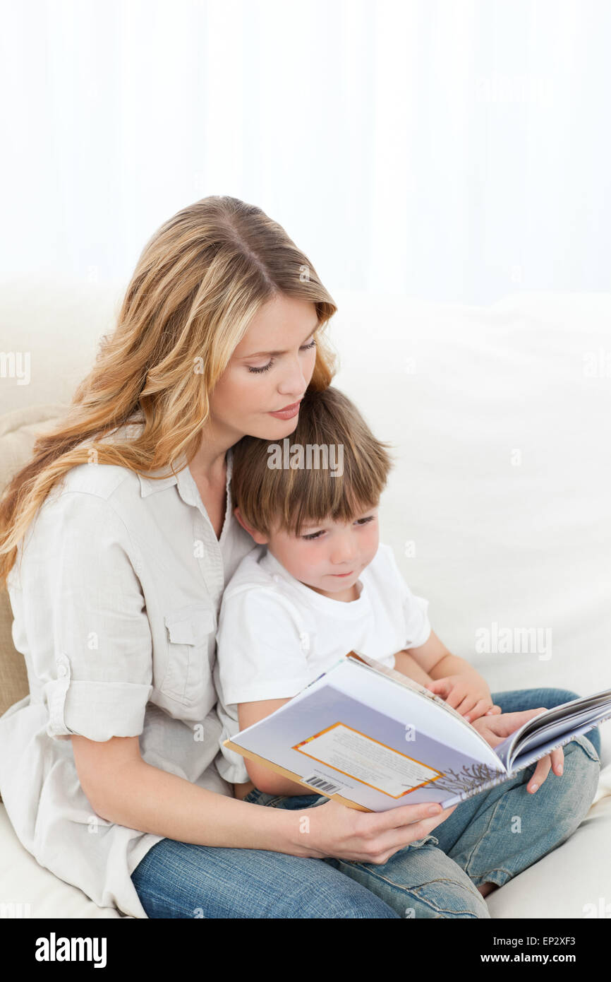 Mother reading with her son Stock Photo - Alamy
