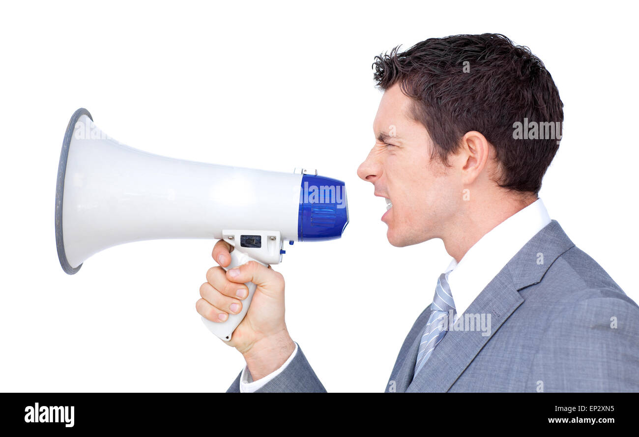 Angry businessman yelling through a megaphone against a white ...