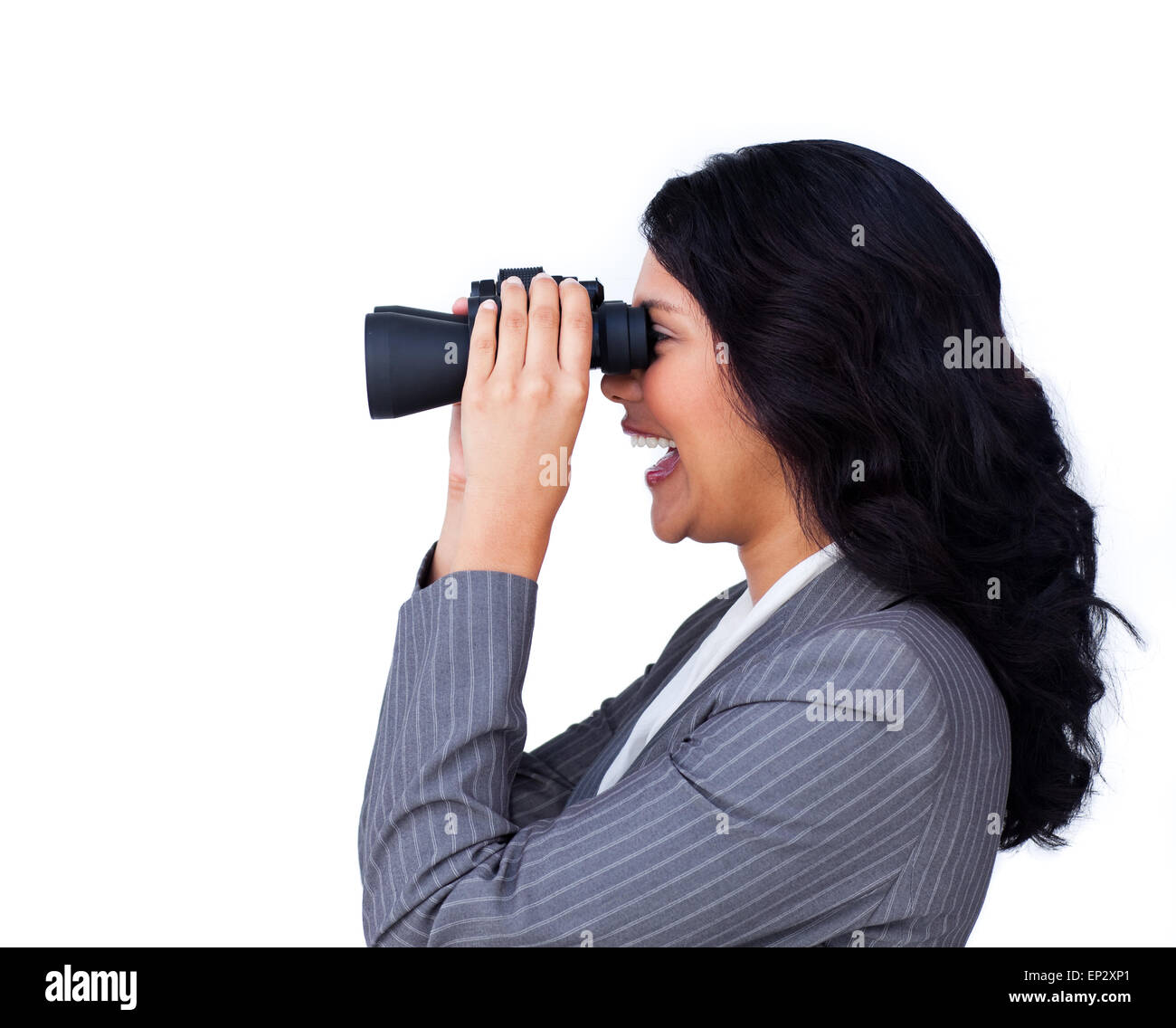 Smiling young businesswoman predicting future success isolated on a ...
