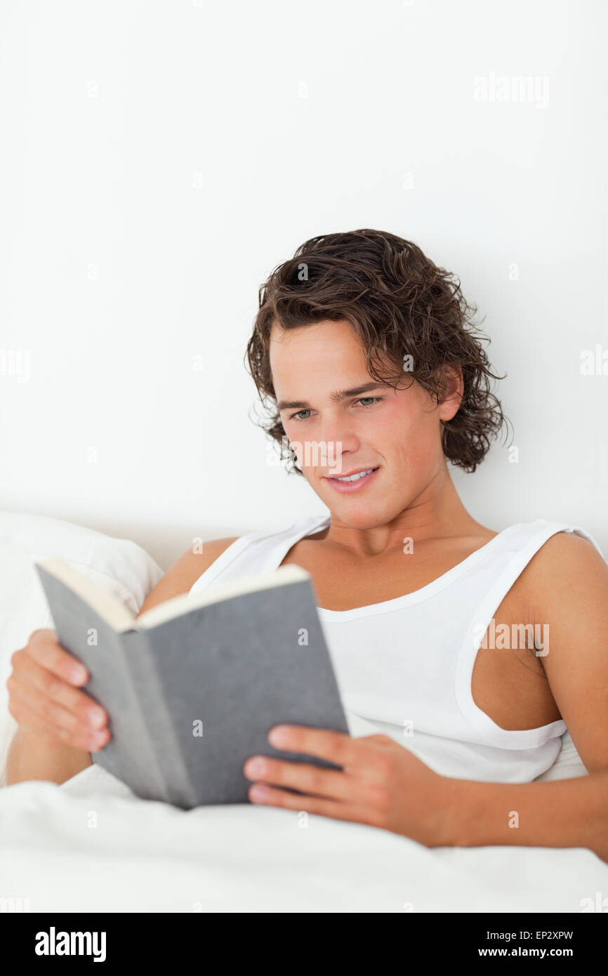 Portrait of a man reading a book Stock Photo - Alamy