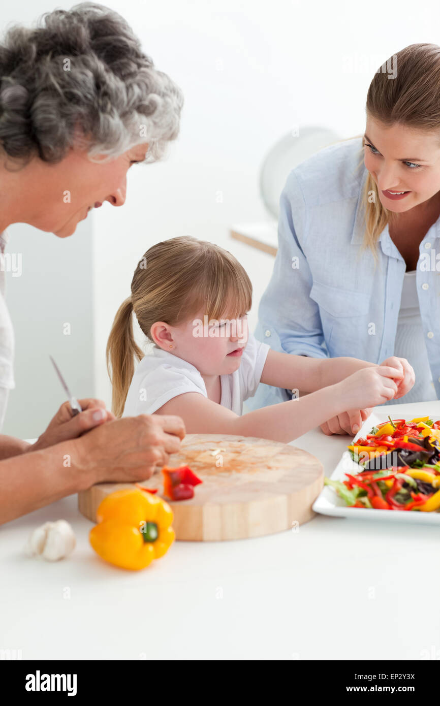 Family cooking together in the kitchen at home Stock Photo - Alamy