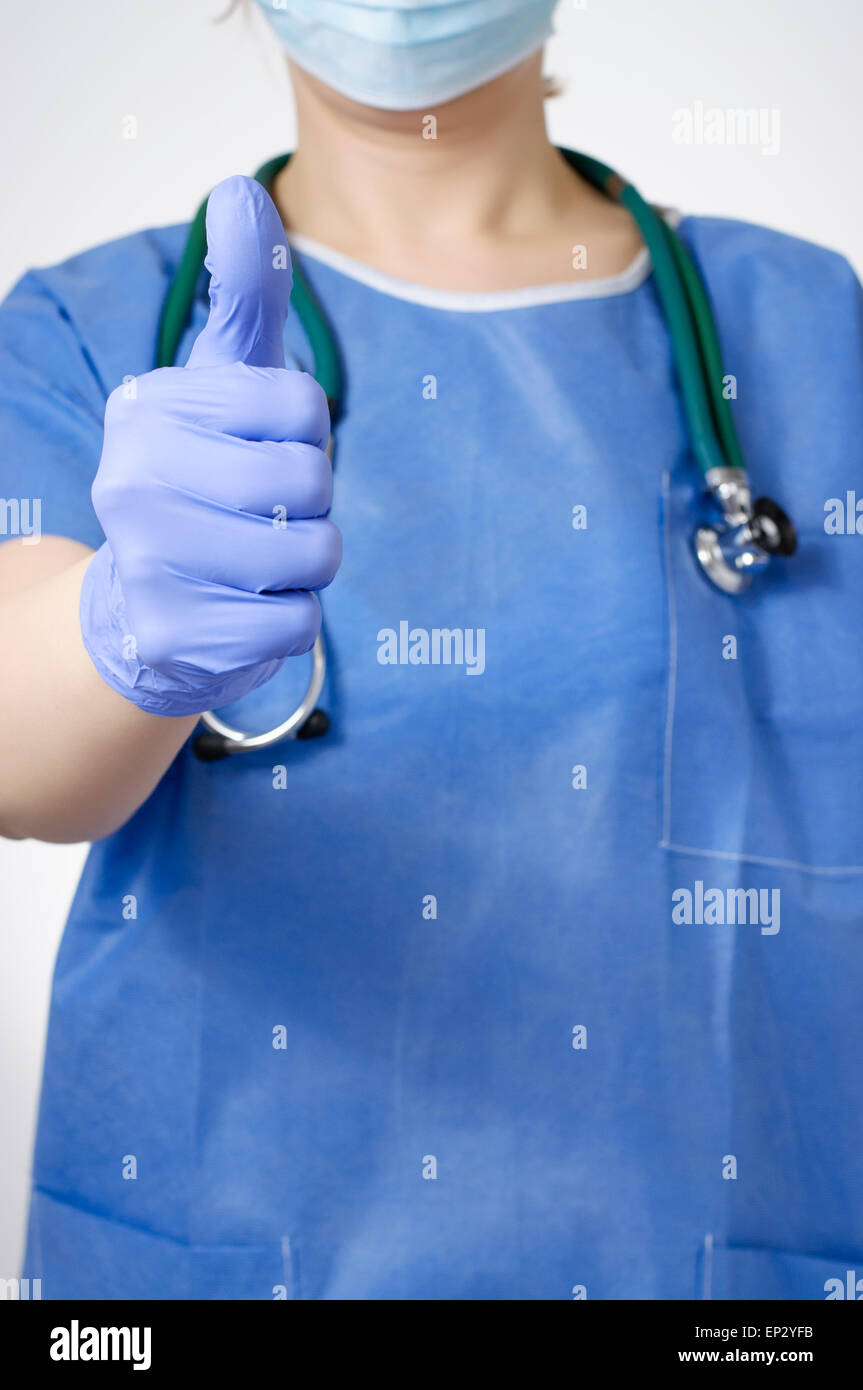 Thumbs up sign female doctor hi-res stock photography and images - Alamy