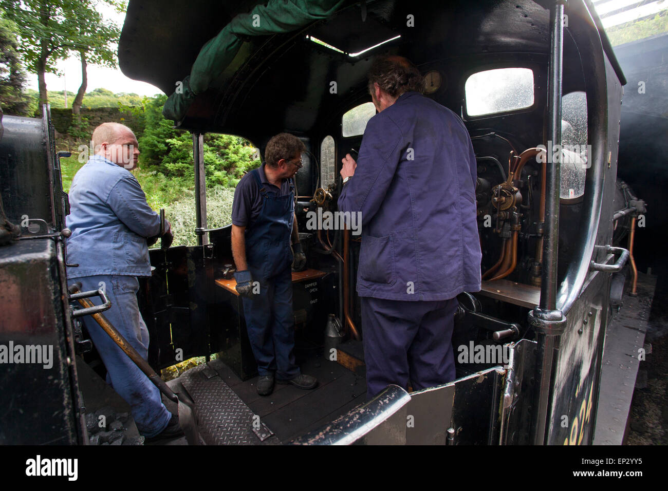 train driver on a steam locomotive at the Keighley and Worth Valley ...